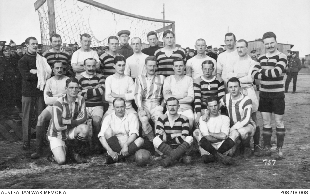 Outdoor portrait of two Allied Prisoner of War (POW) football teams and ...