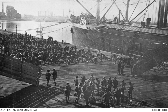 Troops waiting to embark, HMAT Ulysses (A38) in view, image taken from ...
