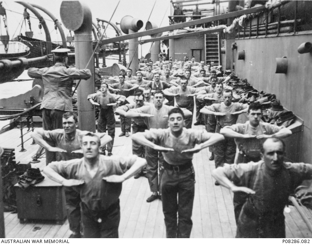 Physical exercise drills on deck aboard the troopship HMAT Euripides ...