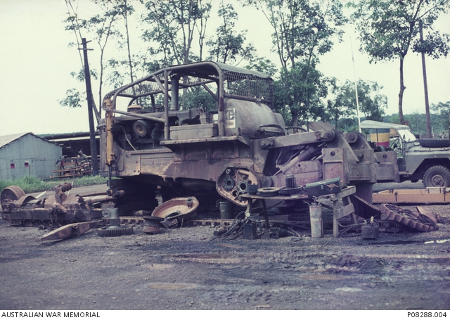 A Caterpillar D8 bulldozer being repaired at the 17th Construction ...