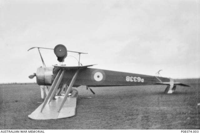Australian Flying Corps (AFC) servicemen examine an Avro 504 aircraft ...