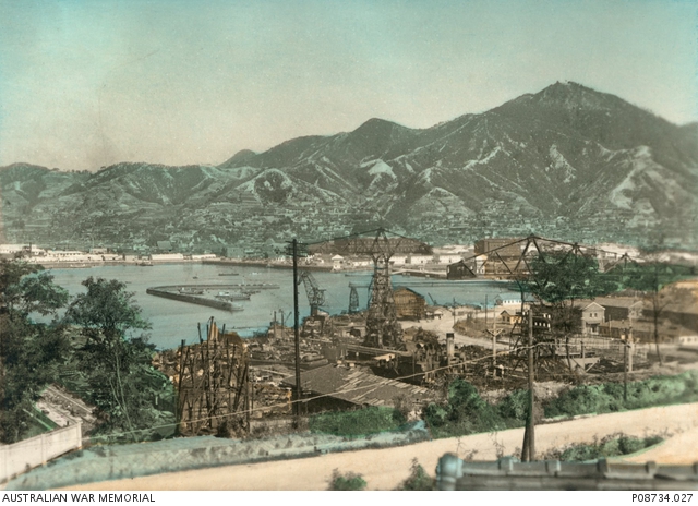 Scene of Kure harbour. The back is stamped '7'. One of a series of ten ...