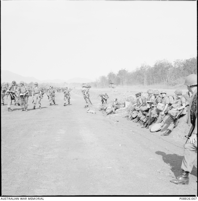 Australian soldiers from 5RAR at Nui Dat waiting for transport ...