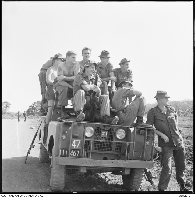 Australian infantry from 5RAR aboard an over loaded Army Land Rover ...
