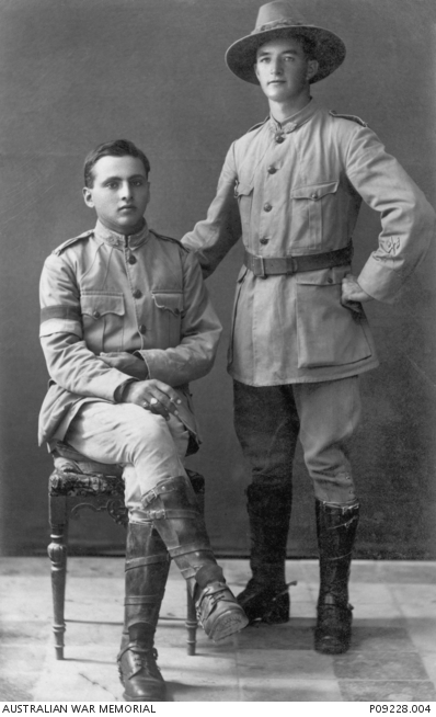 Studio portrait of 1703 Trooper (Tpr) Francis Patrick Mannix (seated), 6th Light Horse Regiment ...