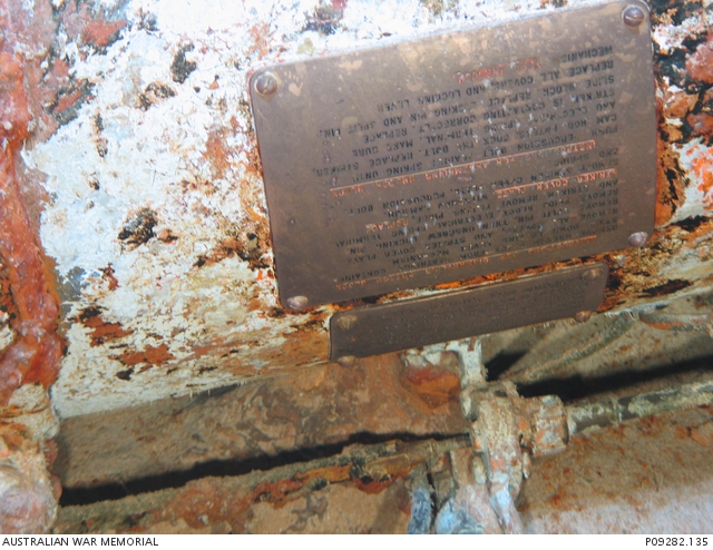 Dive 7 HMAS Sydney II Debris Field Brass tally plate on side of ...