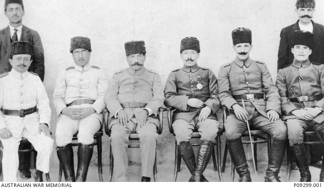 Group portrait of Turkish officers and civilians. This image is from ...