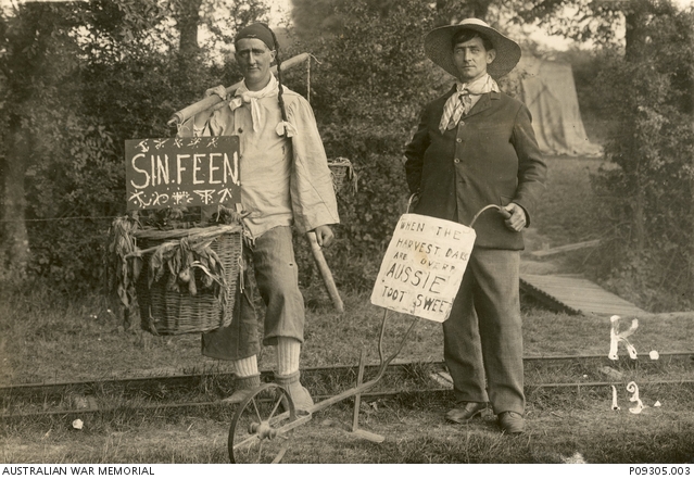 Outdoor portrait of two men, probably patients, at a hospital fancy ...