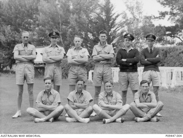 Studio portrait of members of No. 13 Squadron, RAAF. Standing, from ...