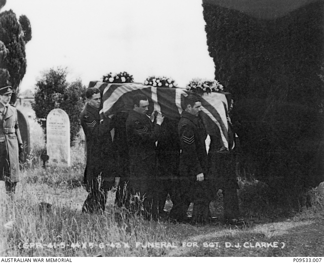 The pall bearers carry the coffin of 414467 Flight Sergeant (Flt Sgt) Daniel Joseph Clarke, RAAF ...