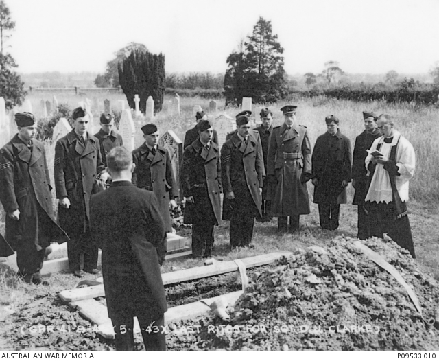 A minister conducts the funeral service of 414467 Flight Sergeant (Flt Sgt) Daniel Joseph Clarke ...