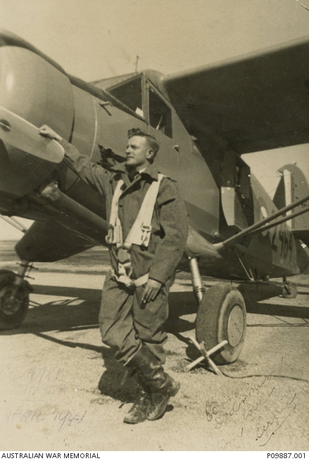 404473 Leading Aircraftman (LAC) Jack Bernard Whyte, RAAF, leaning ...