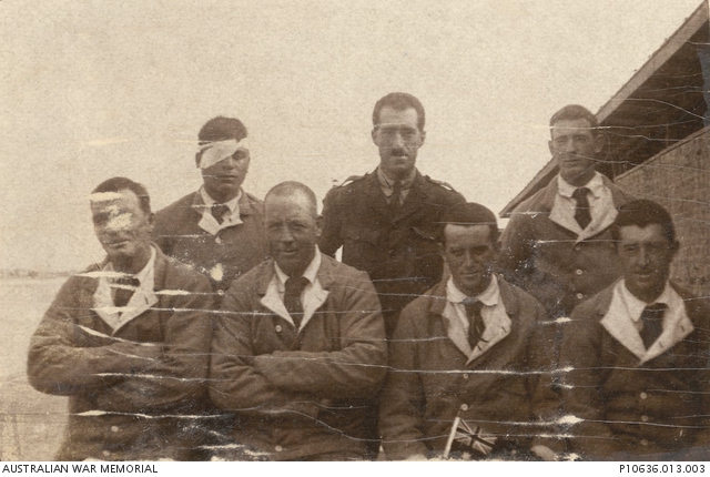 "Anzac eye patients with Captain Waddy" (Album caption). This image is ...