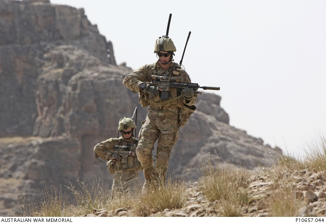 Photograph of Australian soldiers patrolling. One of a series of ...