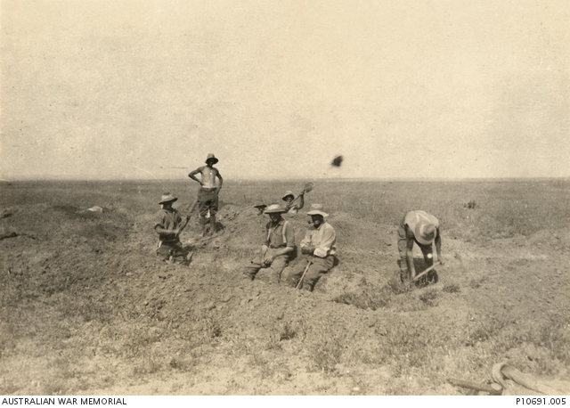Members of the Australian Light Horse digging a trench near Shellal ...