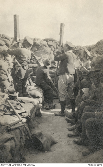 Officers from the Royal Naval Division watching the flight of a ...
