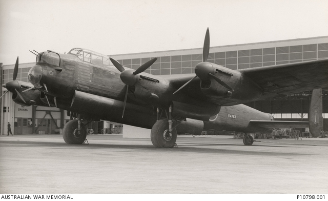 The restored Lancaster, G for George, on the tarmac outside a hangar at ...