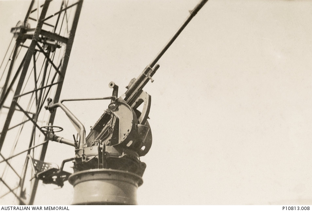"Italian Breda AA gun on HMAS Perth". This image is from a collection ...