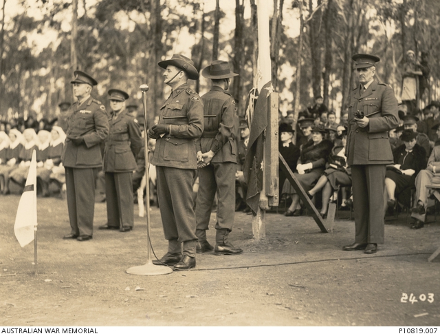 Parade ground photograph of army officers. Identified in centre is ...