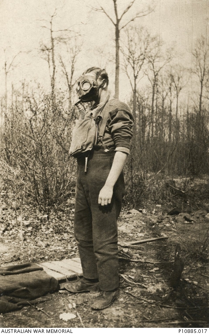 An unidentified scout wears his gas mask at the Western Front. An image ...