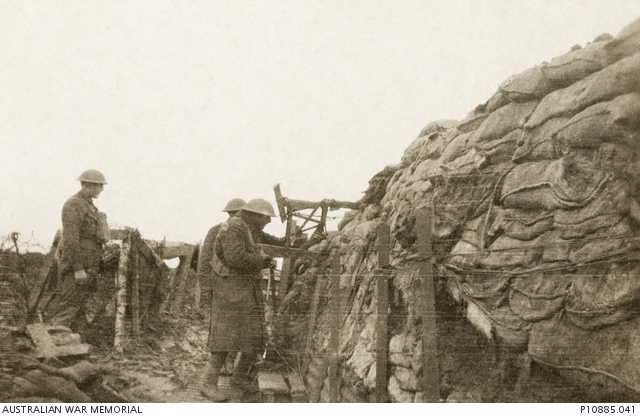 Three scouts using a sniperscope in the square farm trenches, the ...