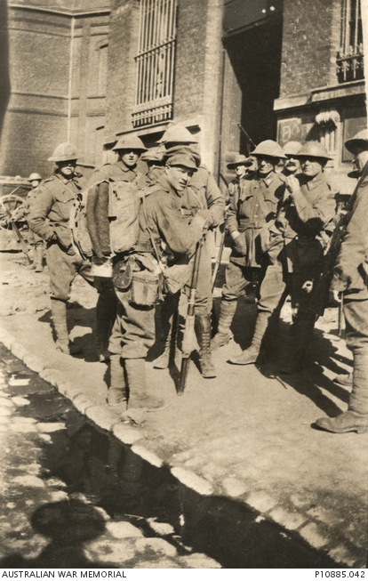 An unidentified soldier wearing his full marching order kit stands with ...