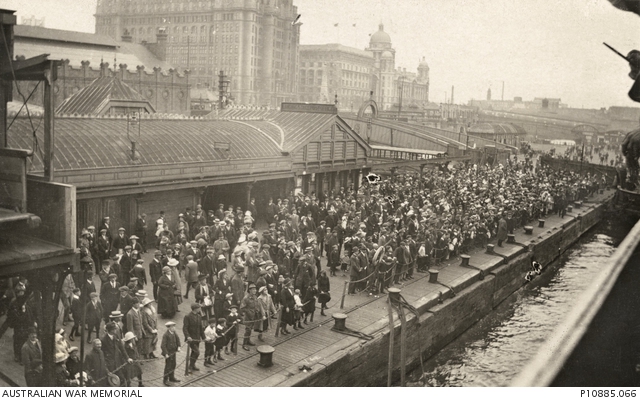 Crowds gather on the wharf at Liverpool, England, to farewell troops ...