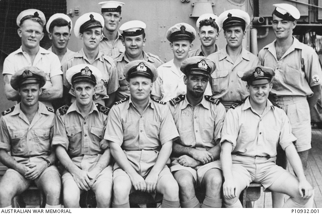 Group portrait of crew members of HMAS Ipswich at Flour Mill Wharf ...
