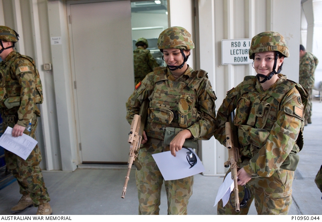 ADF personnel undertake weapons loading and unloading training at a ...