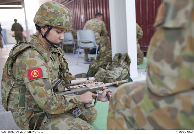 ADF personnel undertake weapons loading and unloading training at a ...