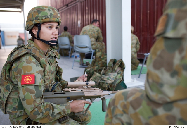 ADF personnel undertake weapons loading and unloading training at a ...