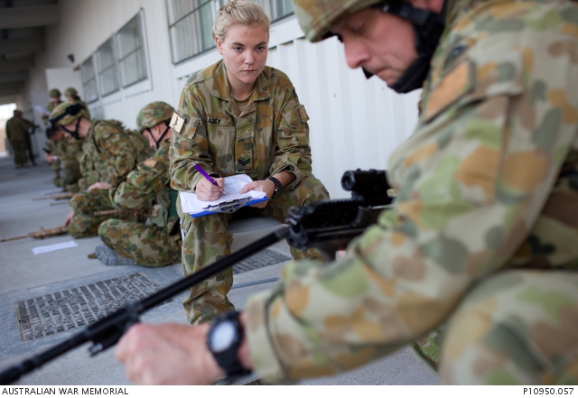 ADF personnel undertake weapons loading and unloading training at a ...
