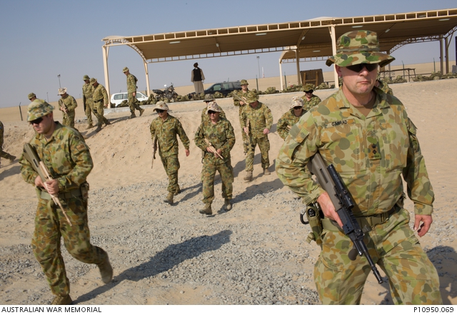 ADF personnel prepare to search for unexpolded devices in the training ...
