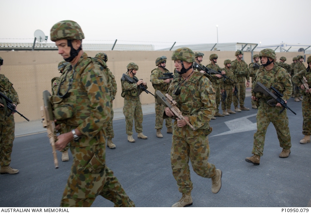 ADF personnel head out to the firing range for weapons firing practice ...