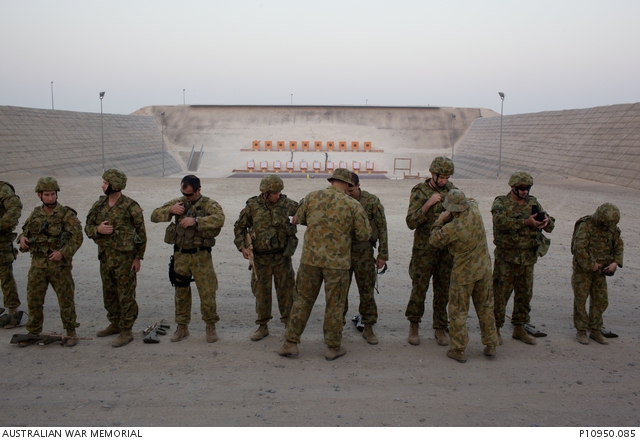 ADF personnel undertake weapons firing training at a Reception Staging ...