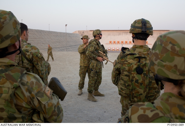 ADF personnel undertake weapons firing training at a Reception Staging ...