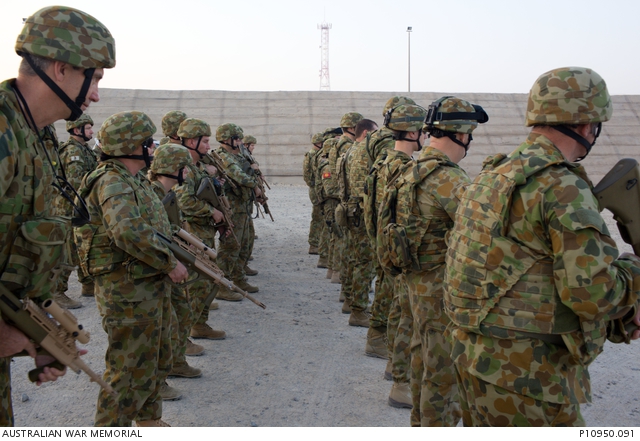 ADF personnel undertake weapons firing training at a Reception Staging ...