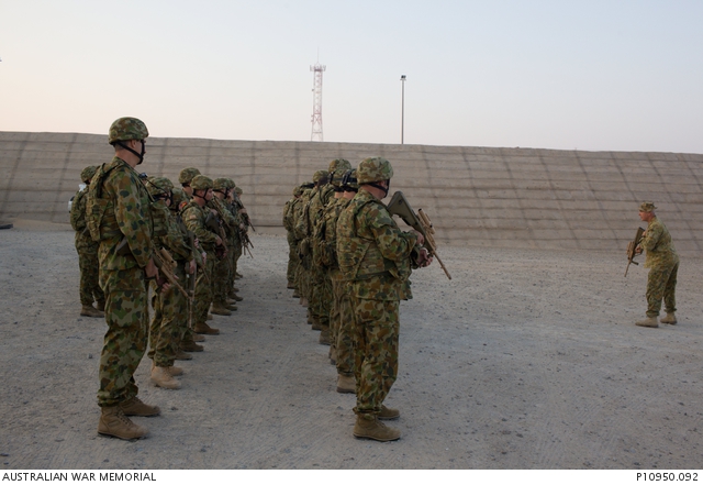 ADF personnel undertake weapons firing training at a Reception Staging ...