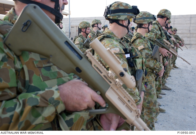 ADF personnel undertake weapons firing training at a Reception Staging ...