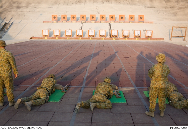 ADF personnel undertake weapons firing training at a Reception Staging ...