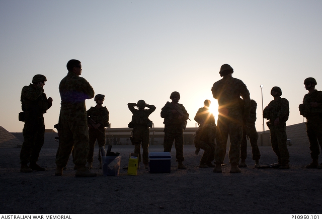 ADF personnel undertake weapons firing training at a Reception Staging ...