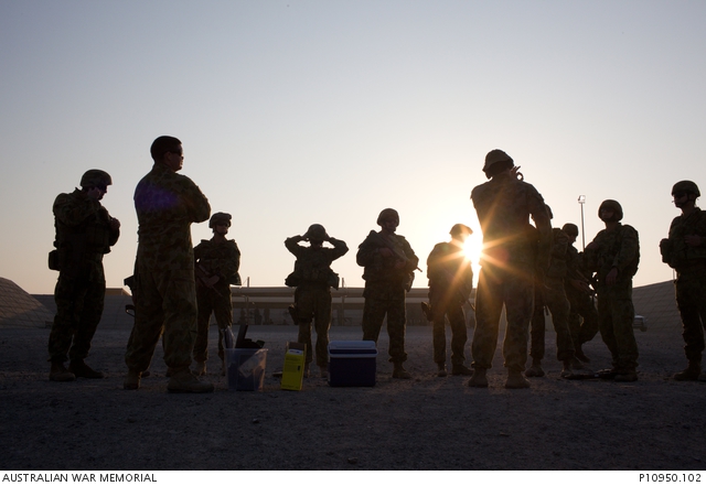 ADF personnel undertake weapons firing training at a Reception Staging ...