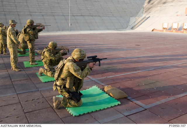 ADF personnel undertake weapons firing training at a Reception Staging ...