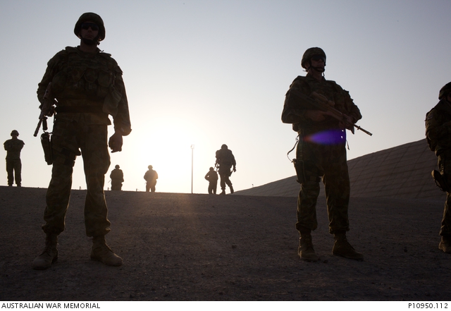 ADF personnel undertake weapons firing training at a Reception Staging ...