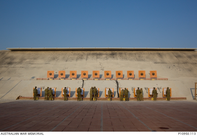 ADF personnel undertake weapons firing training at a Reception Staging ...