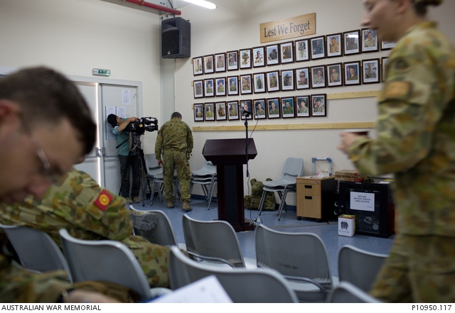 ADF personnel inside the lecture hall of the Reception Staging Onward ...