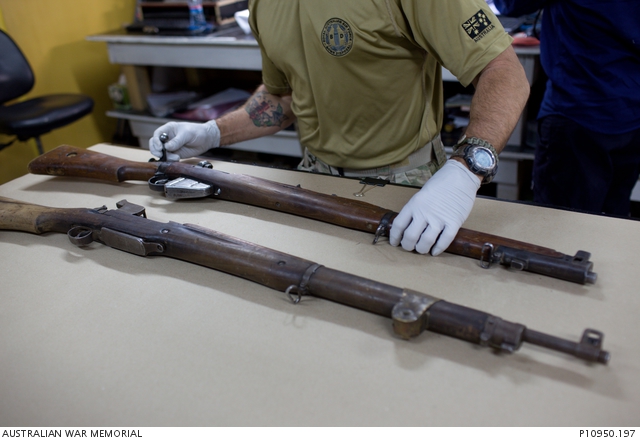 Warrant Officer Rodney Amos RAAF, an Explosive Ordnance Disposal (EOD ...