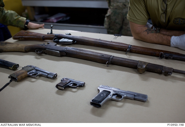 Warrant Officer Rodney Amos RAAF, an Explosive Ordnance Disposal (EOD ...