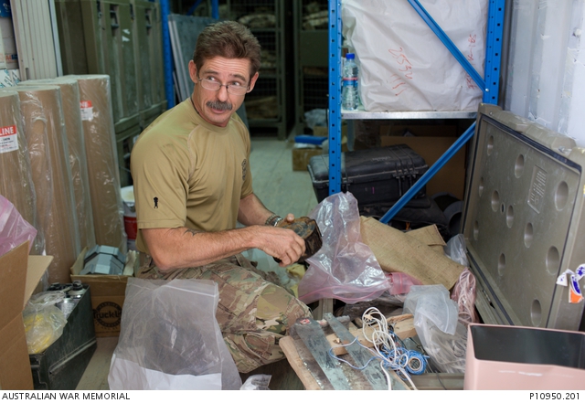 Warrant Officer Rodney Amos RAAF, an Explosive Ordnance Disposal (EOD ...