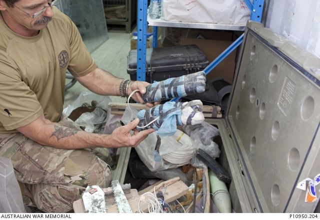 Warrant Officer Rodney Amos RAAF, an Explosive Ordnance Disposal (EOD ...